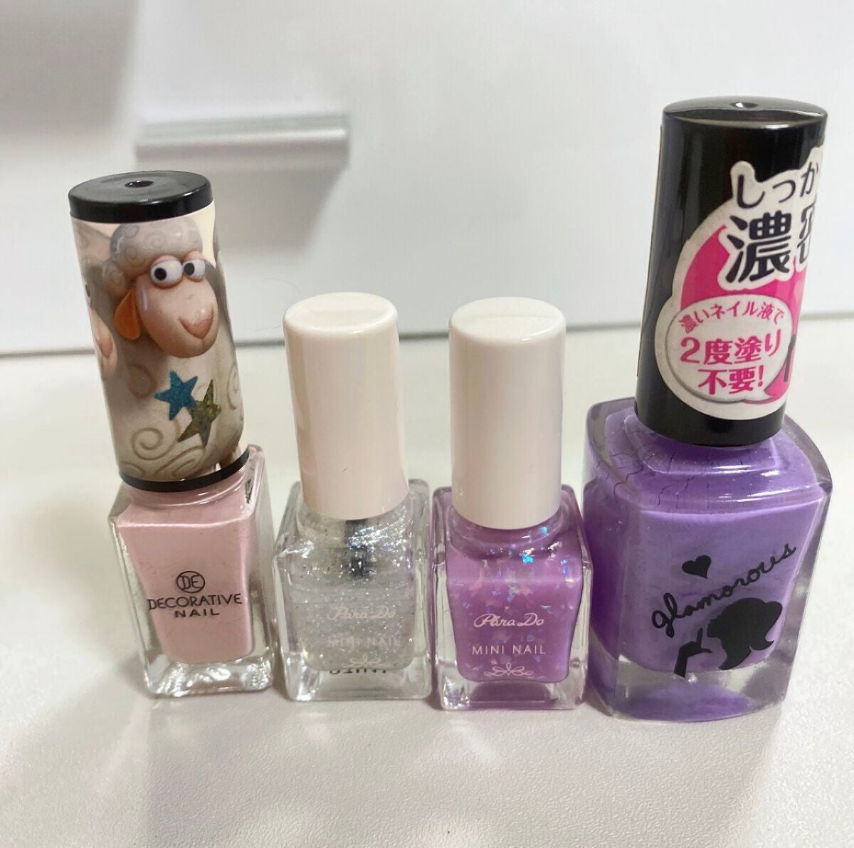 Art Collection・パラドゥ・decorative Nailのマニキュアを使った口コミ 手はピンクとパープル! そしてキラキラ